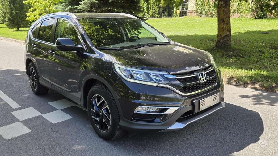 Brown Honda CR-V 2017 in Panevezys, with an engine capacity of 1.60 L and mileage of 260 thousand km for 11200 €, photo 11 on AUTOMOTO.COM.LV
