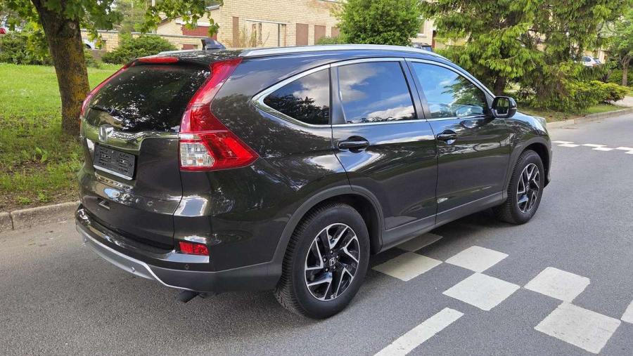 Brown Honda CR-V 2017 in Panevezys, with an engine capacity of 1.60 L and mileage of 260 thousand km for 11200 €, photo 14 on AUTOMOTO.COM.LV