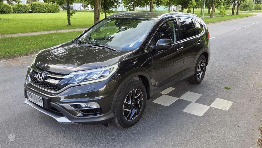 Brown Honda CR-V 2017 in Panevezys, with an engine capacity of 1.60 L and mileage of 260 thousand km for 11200 €, photo 16 on AUTOMOTO.COM.LV