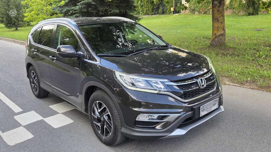 Brown Honda CR-V 2017 in Panevezys, with an engine capacity of 1.60 L and mileage of 260 thousand km for 11200 €, photo 17 on AUTOMOTO.COM.LV
