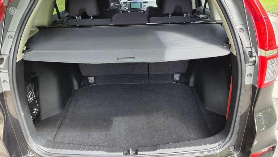 Brown Honda CR-V 2017 in Panevezys, with an engine capacity of 1.60 L and mileage of 260 thousand km for 11200 €, photo 23 on AUTOMOTO.COM.LV