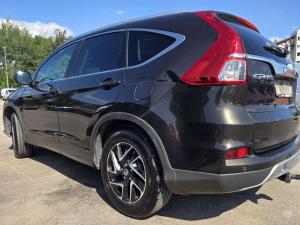 Brown Honda CR-V 2017 in Marijampole, with an engine capacity of 1.60 L and mileage of 302 thousand km for 8800 €, photo 4 on AUTOMOTO.COM.LV