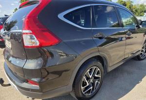 Brown Honda CR-V 2017 in Marijampole, with an engine capacity of 1.60 L and mileage of 302 thousand km for 8800 €, photo 6 on AUTOMOTO.COM.LV