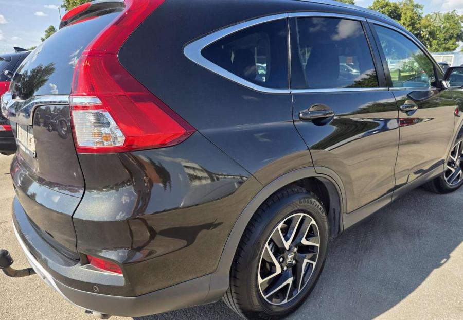 Brown Honda CR-V 2017 in Marijampole, with an engine capacity of 1.60 L and mileage of 302 thousand km for 8800 €, photo 6 on AUTOMOTO.COM.LV