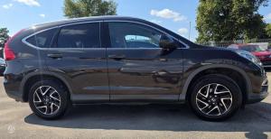 Brown Honda CR-V 2017 in Marijampole, with an engine capacity of 1.60 L and mileage of 302 thousand km for 8800 €, photo 7 on AUTOMOTO.COM.LV