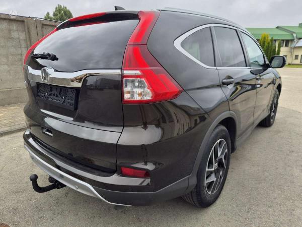 Brown Honda CR-V 2017 in Mazeikiai, with an engine capacity of 1.60 L and mileage of 268 thousand km for 10800 €, photo 6 on AUTOMOTO.COM.LV