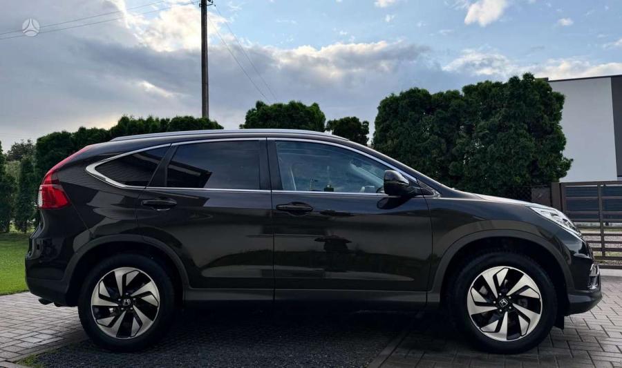 Brown Honda CR-V 2018 in Kaunas, with an engine capacity of 1.60 L and mileage of 199 thousand km for 14800 €, photo 23 on AUTOMOTO.COM.LV