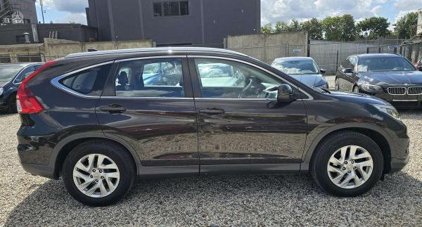 Brown Honda CR-V 2018 in Kaunas, with an engine capacity of 1.60 L and mileage of 299 thousand km for 10999 €, photo 4 on AUTOMOTO.COM.LV