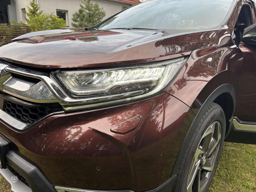 Brown Honda CR-V 2018 in Varena, with an engine capacity of 1.50 L and mileage of 240 thousand km for 17500 €, photo 8 on AUTOMOTO.COM.LV