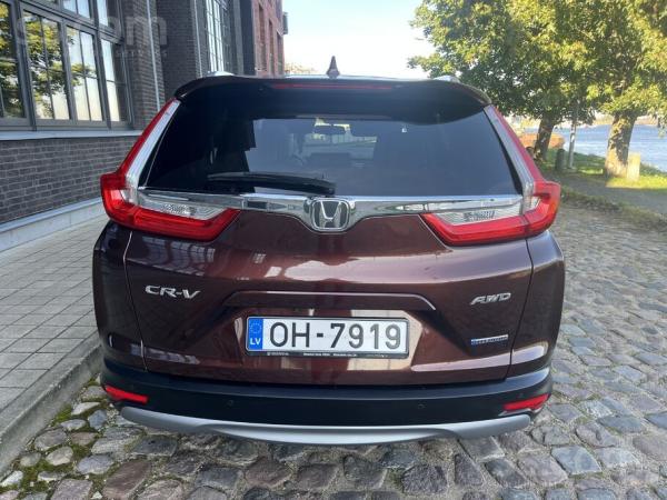 Brown Honda CR-V 2020 in Riga, with an engine capacity of 2.00 L and mileage of 121 thousand km for 24950 €, photo 11 on AUTOMOTO.COM.LV