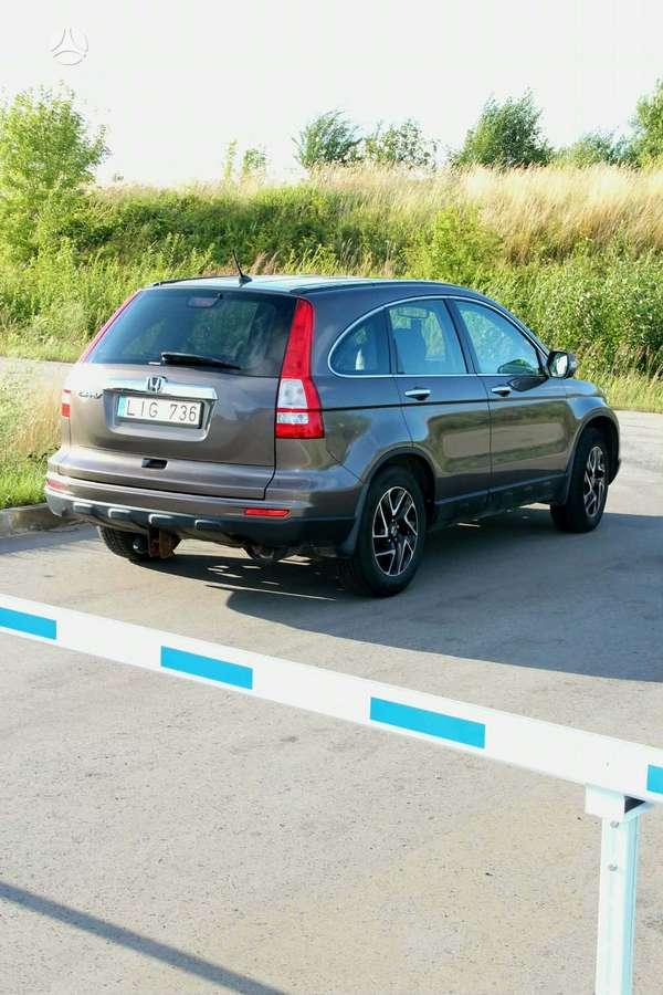 Brūns Honda CR-V 2012 Radviliškis, ar dzinēja tilpumu 2.20 L un nobraukumu 210 tūkst. km par 8200 €, foto 4 vietnē AUTOMOTO.COM.LV