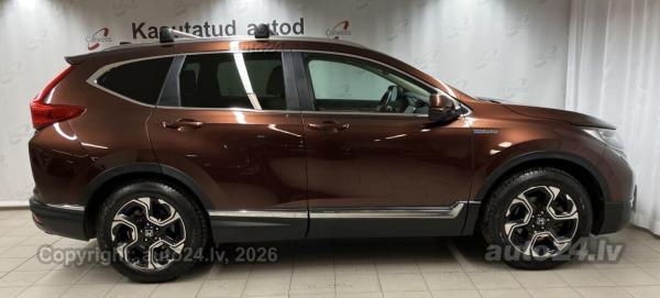 Brown Honda CR-V 2021 in Tallinn, with an engine capacity of 2.00 L and mileage of 123 thousand km for 25900 €, photo 4 on AUTOMOTO.COM.LV