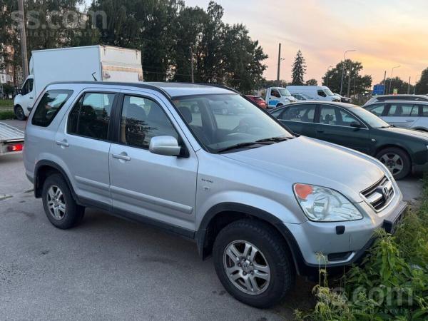Honda CR-V 2002 in Riga, with an engine capacity of 2.00 L and mileage of 377 thousand km for 650 €, photo 5 on AUTOMOTO.COM.LV