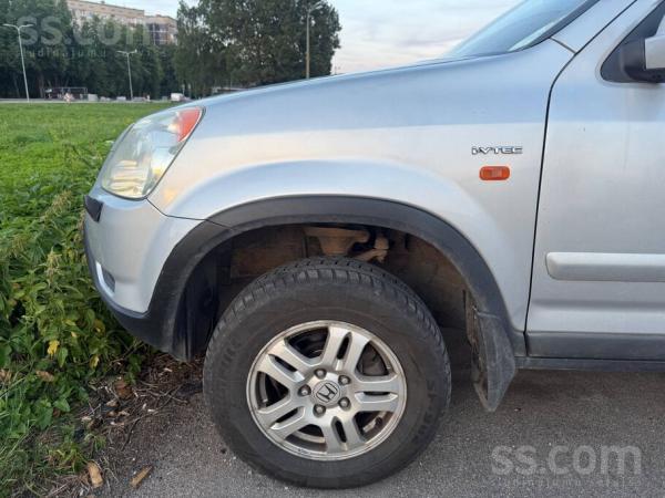 Honda CR-V 2002 in Riga, with an engine capacity of 2.00 L and mileage of 377 thousand km for 650 €, photo 6 on AUTOMOTO.COM.LV