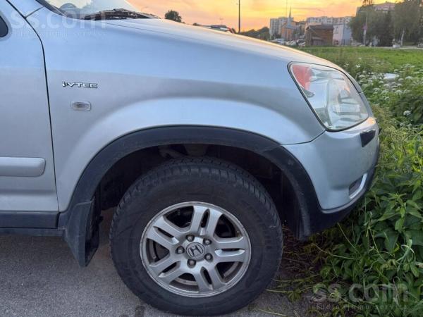 Honda CR-V 2002 in Riga, with an engine capacity of 2.00 L and mileage of 377 thousand km for 650 €, photo 7 on AUTOMOTO.COM.LV