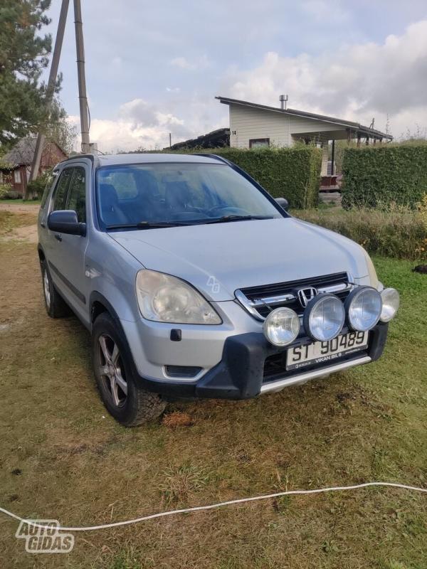 Honda CR-V 2004 in Panevezys, with an engine capacity of 2.00 L and mileage of 240 thousand km for 2000 €, photo 1 on AUTOMOTO.COM.LV
