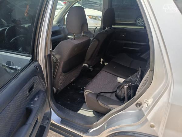 Honda CR-V 2005 in Utena, with an engine capacity of 2.20 L and mileage of 310 thousand km for 2000 €, photo 5 on AUTOMOTO.COM.LV