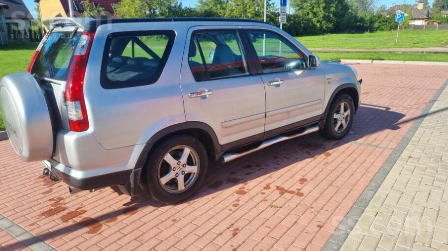 Honda CR-V 2006 in Jelgava, with an engine capacity of 2.00 L and mileage of 230 thousand km for 950 €, photo 7 on AUTOMOTO.COM.LV