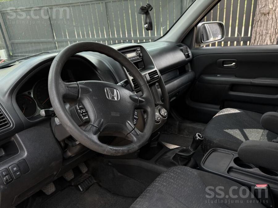 Honda CR-V 2006 in Valmiera, with an engine capacity of 2.20 L and mileage of 250 thousand km for 900 €, photo 4 on AUTOMOTO.COM.LV