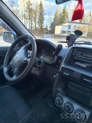 Honda CR-V 2006 in Riga, with an engine capacity of 2.00 L and mileage of 138 thousand km for 3000 €, photo 11 on AUTOMOTO.COM.LV
