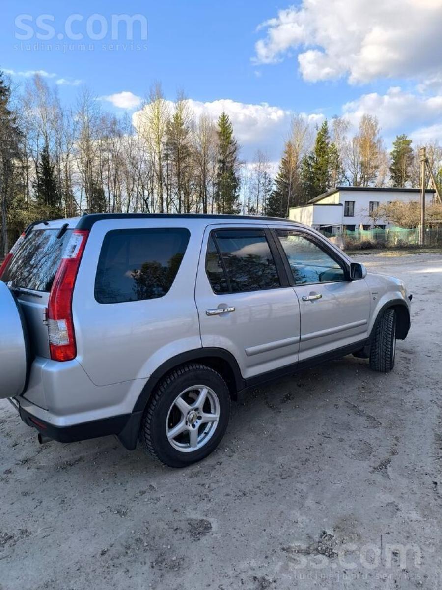 Honda CR-V 2006 in Riga, with an engine capacity of 2.00 L and mileage of 138 thousand km for 3000 €, photo 12 on AUTOMOTO.COM.LV