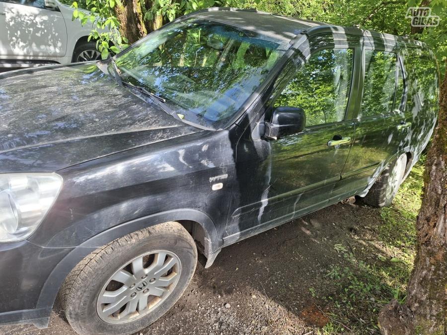Honda CR-V 2006 in Vilnius, with an engine capacity of 2.00 L and mileage of 214 thousand km for 699 €, photo 4 on AUTOMOTO.COM.LV