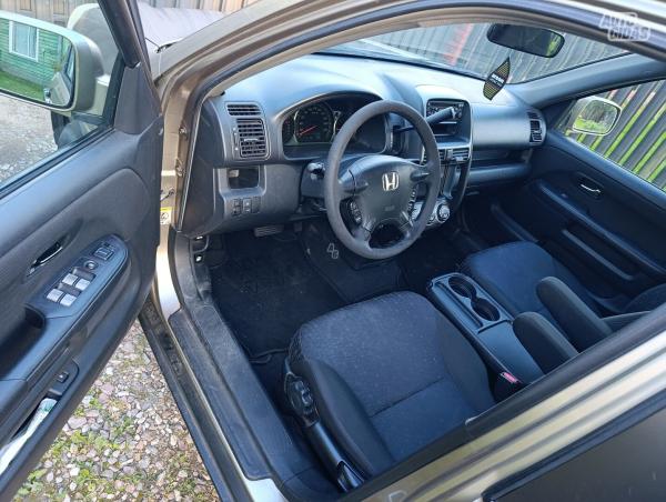 Honda CR-V 2006 Marijampole, ar dzinēja tilpumu 2.00 L un nobraukumu 233 tūkst. km par 2300 €, foto 9 vietnē AUTOMOTO.COM.LV