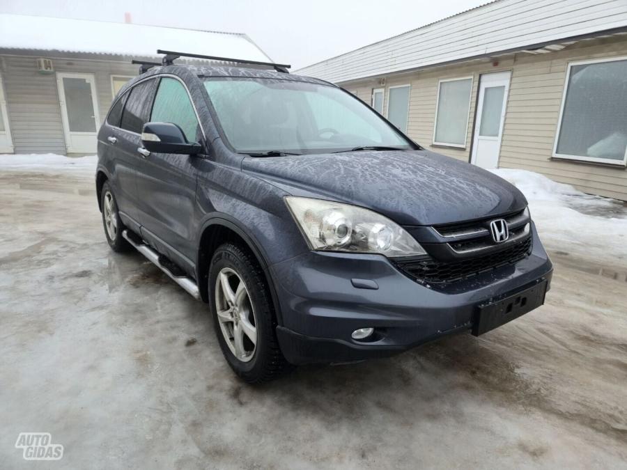 Honda CR-V 2011 in Vilnius, with an engine capacity of 2.20 L and mileage of 223 thousand km for 7100 €, photo 1 on AUTOMOTO.COM.LV