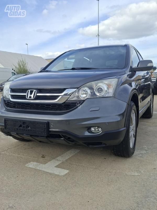 Honda CR-V 2011 in Siauliai, with an engine capacity of 2.20 L and mileage of 355 thousand km for 5750 €, photo 1 on AUTOMOTO.COM.LV