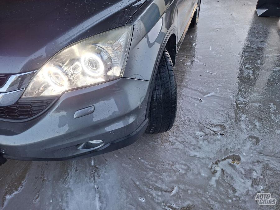 Honda CR-V 2011 in Siauliai, with an engine capacity of 2.20 L and mileage of 350 thousand km for 5750 €, photo 4 on AUTOMOTO.COM.LV