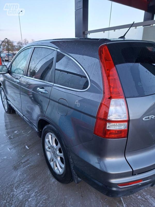 Honda CR-V 2011 in Siauliai, with an engine capacity of 2.20 L and mileage of 350 thousand km for 5750 €, photo 6 on AUTOMOTO.COM.LV