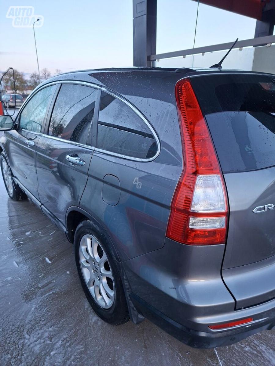 Honda CR-V 2011 in Siauliai, with an engine capacity of 2.20 L and mileage of 350 thousand km for 5750 €, photo 6 on AUTOMOTO.COM.LV