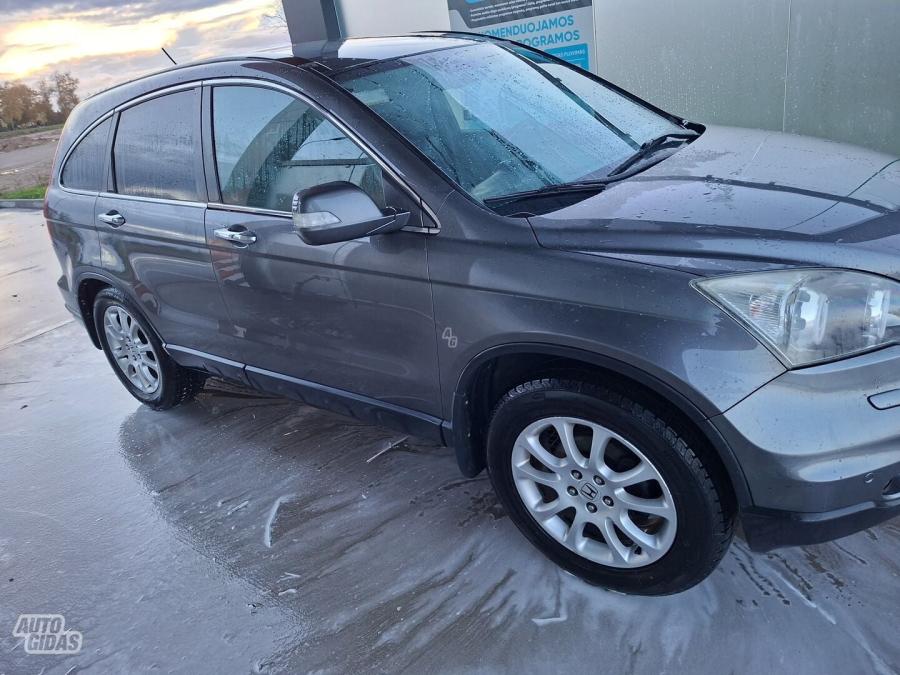 Honda CR-V 2011 in Siauliai, with an engine capacity of 2.20 L and mileage of 350 thousand km for 5750 €, photo 8 on AUTOMOTO.COM.LV