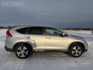 Honda CR-V 2012 in Ogre, with an engine capacity of 2.20 L and mileage of 227 thousand km for 10800 €, photo 5 on AUTOMOTO.COM.LV