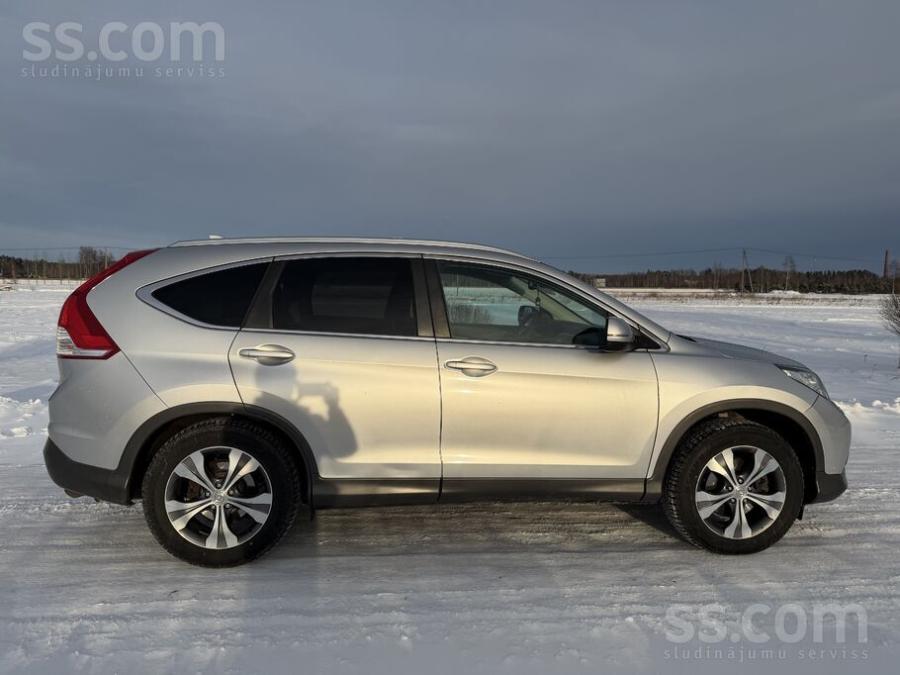 Honda CR-V 2012 in Ogre, with an engine capacity of 2.20 L and mileage of 227 thousand km for 10800 €, photo 5 on AUTOMOTO.COM.LV