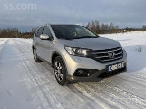 Honda CR-V 2012 in Ogre, with an engine capacity of 2.20 L and mileage of 227 thousand km for 10800 €, photo 6 on AUTOMOTO.COM.LV