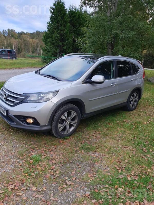 Honda CR-V 2013 in Riga, with an engine capacity of 2.20 L and mileage of 247 thousand km for 8500 €, photo 11 on AUTOMOTO.COM.LV
