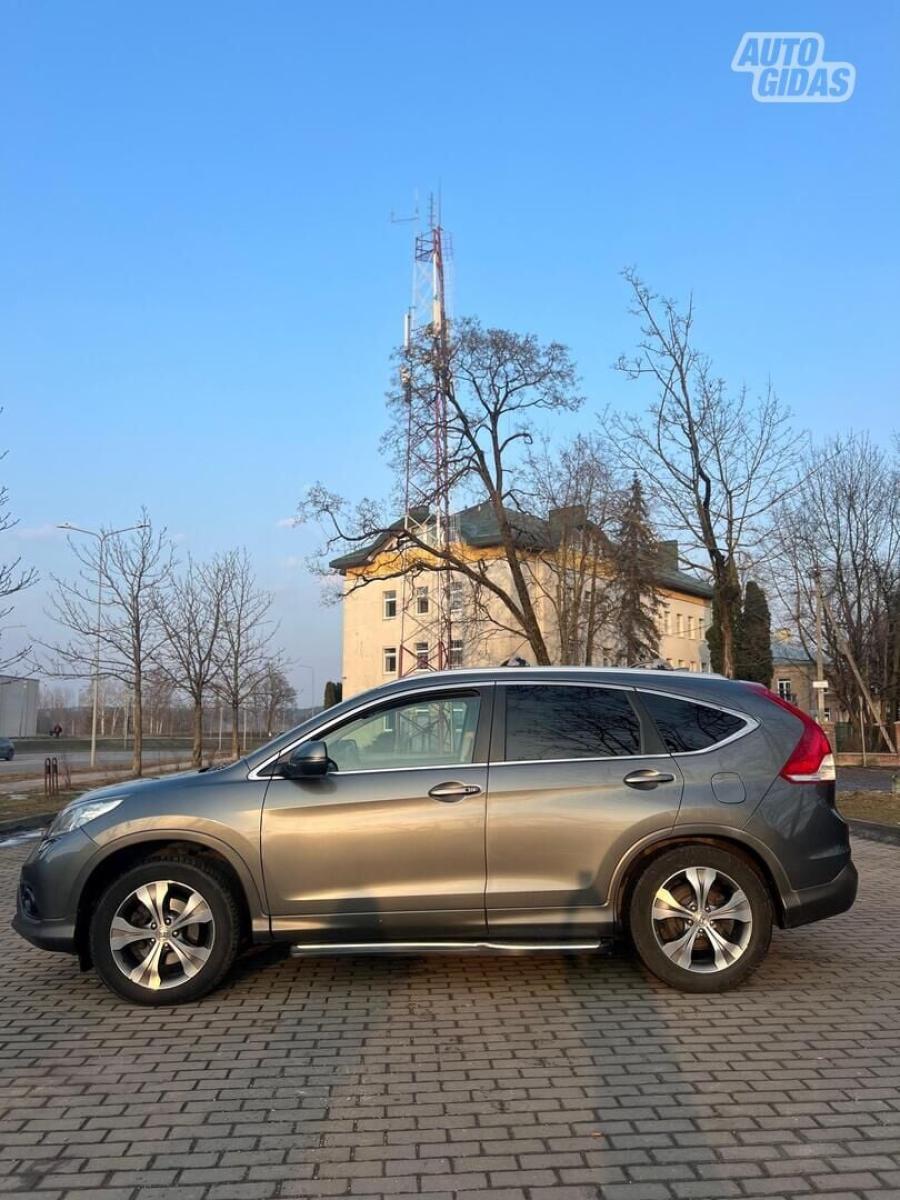 Honda CR-V 2013 in Vilnius, with an engine capacity of 2.20 L and mileage of 270 thousand km for 11111 €, photo 1 on AUTOMOTO.COM.LV