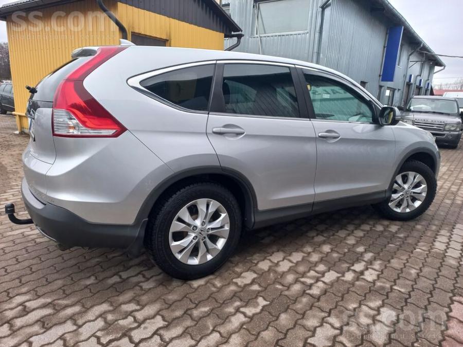 Honda CR-V 2013 in Riga, with an engine capacity of 2.20 L and mileage of 245 thousand km for 11500 €, photo 6 on AUTOMOTO.COM.LV
