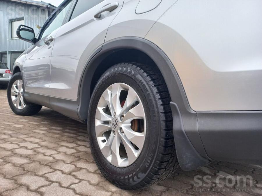 Honda CR-V 2013 in Riga, with an engine capacity of 2.20 L and mileage of 245 thousand km for 11500 €, photo 9 on AUTOMOTO.COM.LV
