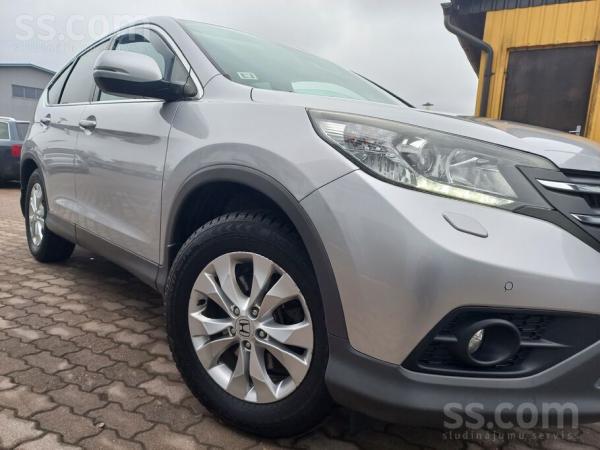 Honda CR-V 2013 Rīga, ar dzinēja tilpumu 2.20 L un nobraukumu 245 tūkst. km par 11500 €, foto 9 vietnē AUTOMOTO.COM.LV