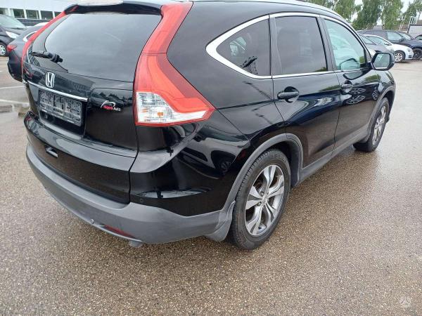 Honda CR-V 2013 in Marijampole, with an engine capacity of 2.20 L and mileage of 268 thousand km for 7800 €, photo 4 on AUTOMOTO.COM.LV