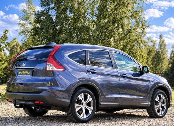 Honda CR-V 2014 in Siauliai, with an engine capacity of 2.20 L and mileage of 258 thousand km for 13999 €, photo 5 on AUTOMOTO.COM.LV