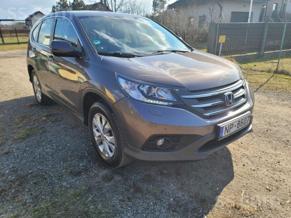 Honda CR-V 2015 Rīga, ar dzinēja tilpumu 1.60 L un nobraukumu 241 tūkst. km par 8900 €, foto 6 vietnē AUTOMOTO.COM.LV