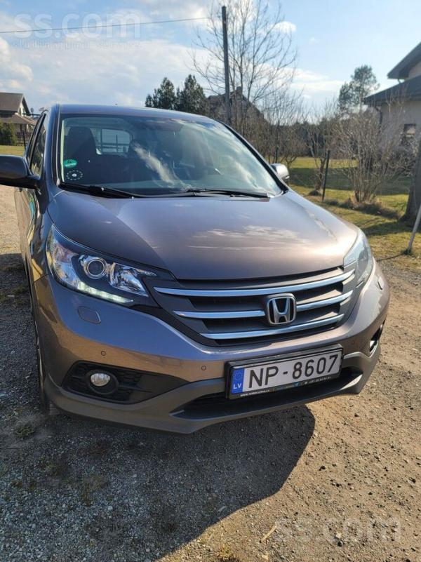 Honda CR-V 2015 Rīga, ar dzinēja tilpumu 1.60 L un nobraukumu 241 tūkst. km par 8400 €, foto 5 vietnē AUTOMOTO.COM.LV