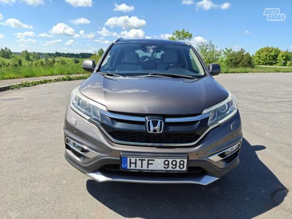 Honda CR-V 2015 in Vilnius, with an engine capacity of 1.60 L and mileage of 239 thousand km for 12800 €, photo 2 on AUTOMOTO.COM.LV