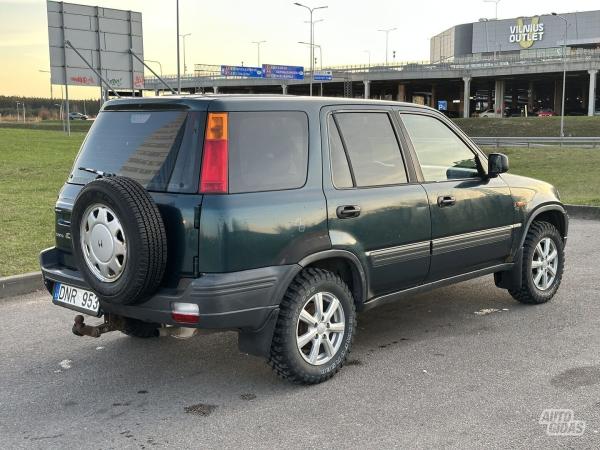 Green Honda CR-V 1998 in Vilnius, with an engine capacity of 2.00 L and mileage of 304 thousand km for 2100 €, photo 2 on AUTOMOTO.COM.LV