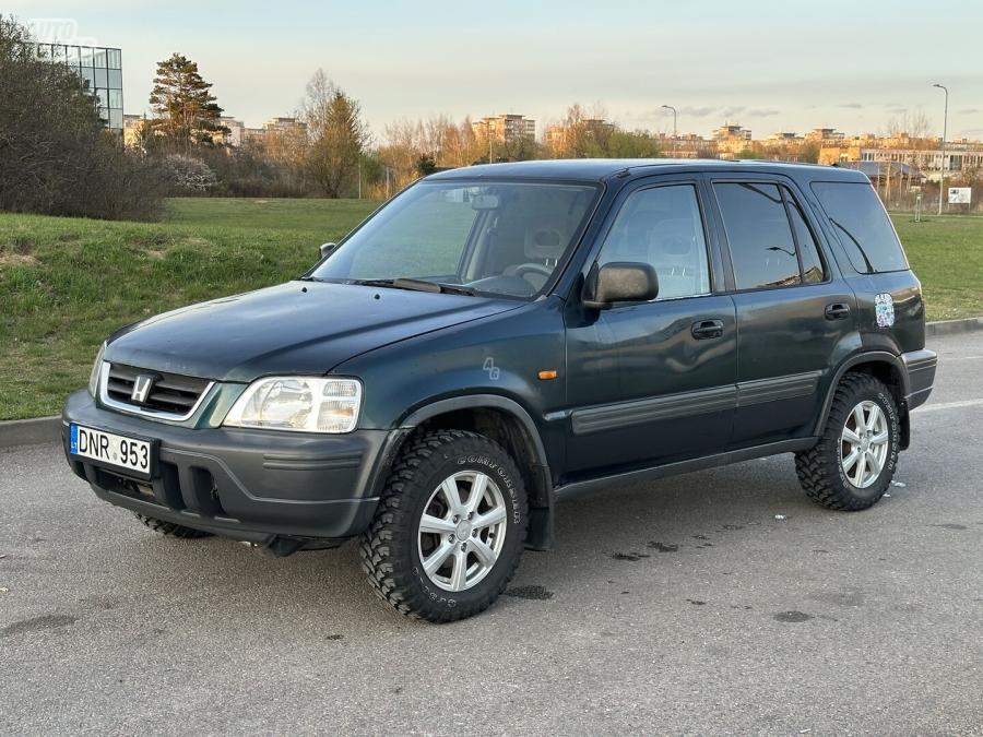Green Honda CR-V 1998 in Vilnius, with an engine capacity of 2.00 L and mileage of 304 thousand km for 2100 €, photo 4 on AUTOMOTO.COM.LV