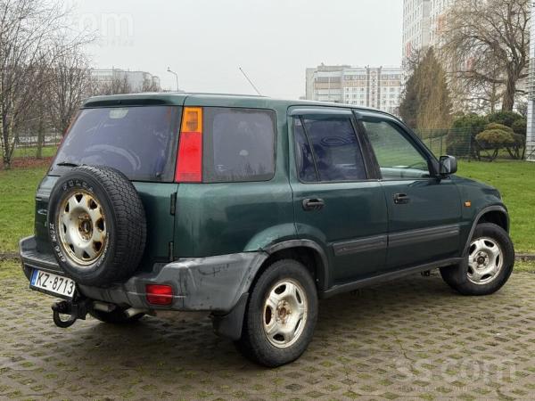 Green Honda CR-V 1999 in Riga, with an engine capacity of 2.00 L and mileage of 422 thousand km for 725 €, photo 5 on AUTOMOTO.COM.LV