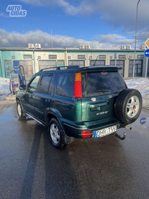 Green Honda CR-V 2000 in Panevezys, with an engine capacity of 2.00 L and mileage of 230 thousand km for 2450 €, photo 6 on AUTOMOTO.COM.LV
